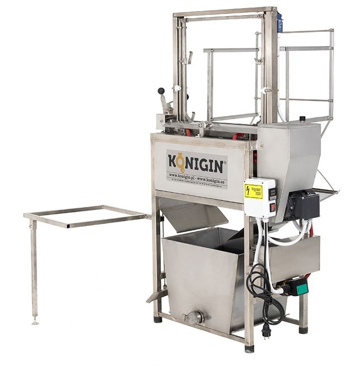 Königin uncapping machine with heated vibrating blades